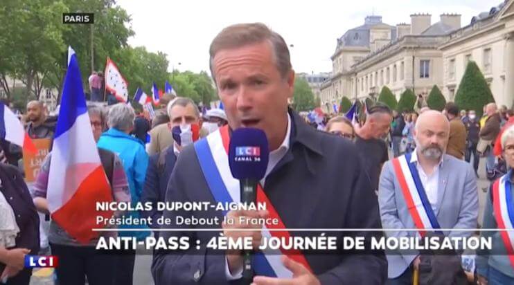 Nicolas Dupont-Aignan remet en place un journaliste de LCI qui déforme ses propos sur le pass ...